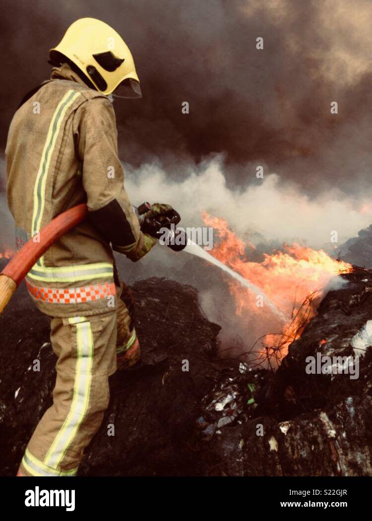 Extinguishing work fire hi-res stock photography and images - Alamy