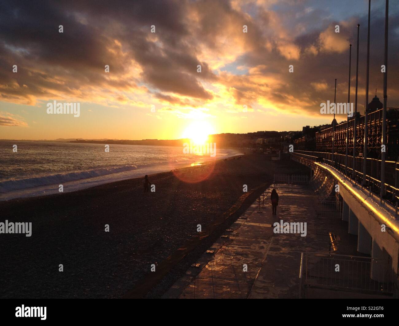 Sunset over Nice Bay of Angels Stock Photo - Alamy