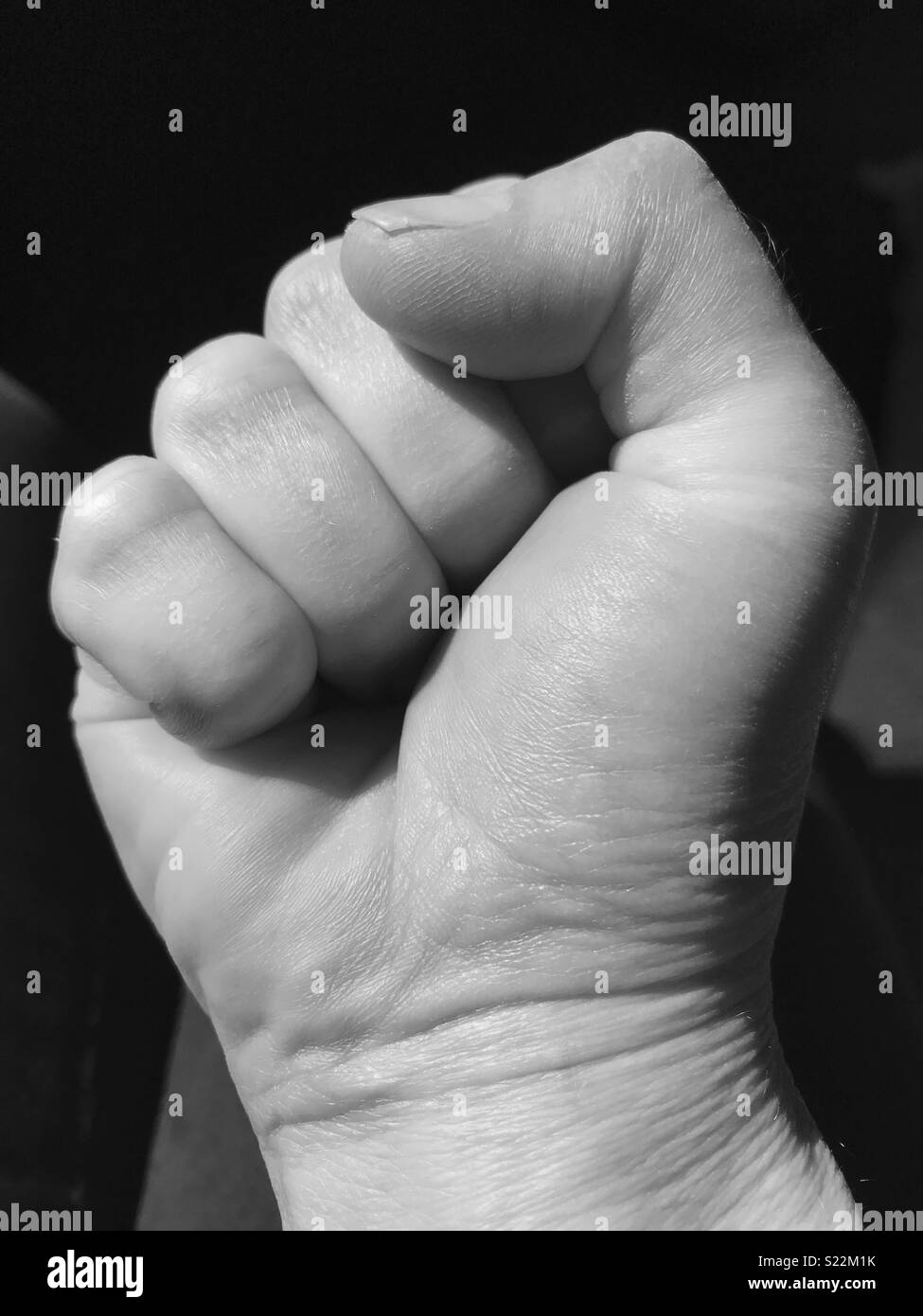 Making a fist hi-res stock photography and images - Alamy