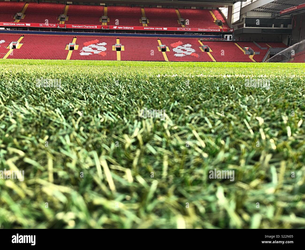 Low shot of the turf overlooking the pitch at Anfield, Liverpool Stock ...