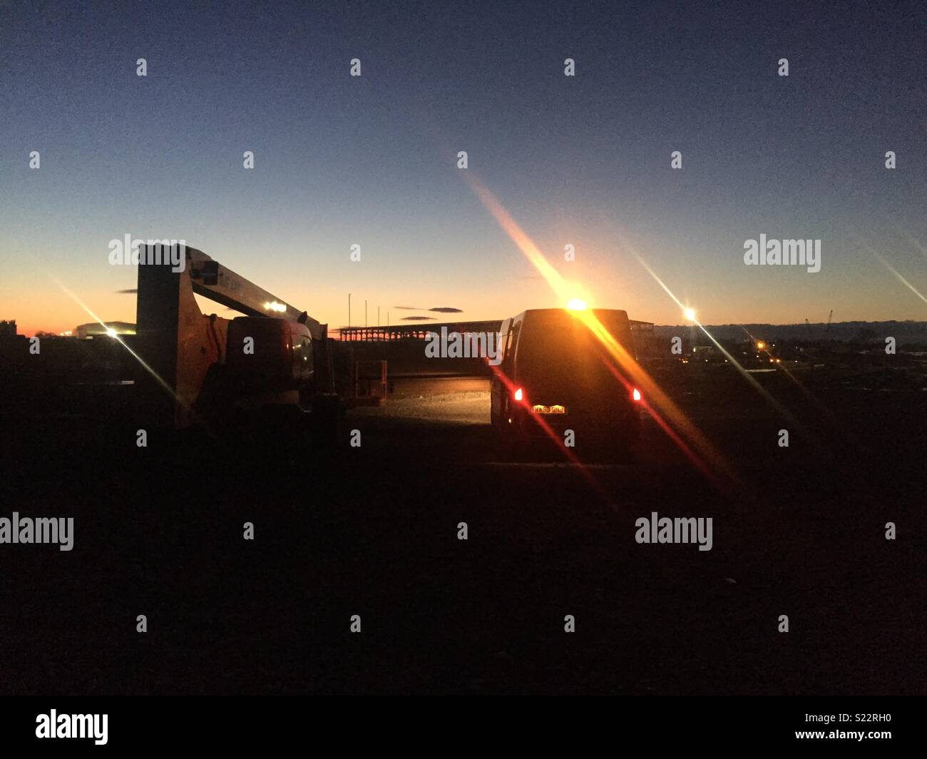 Sunset at work Stock Photo - Alamy