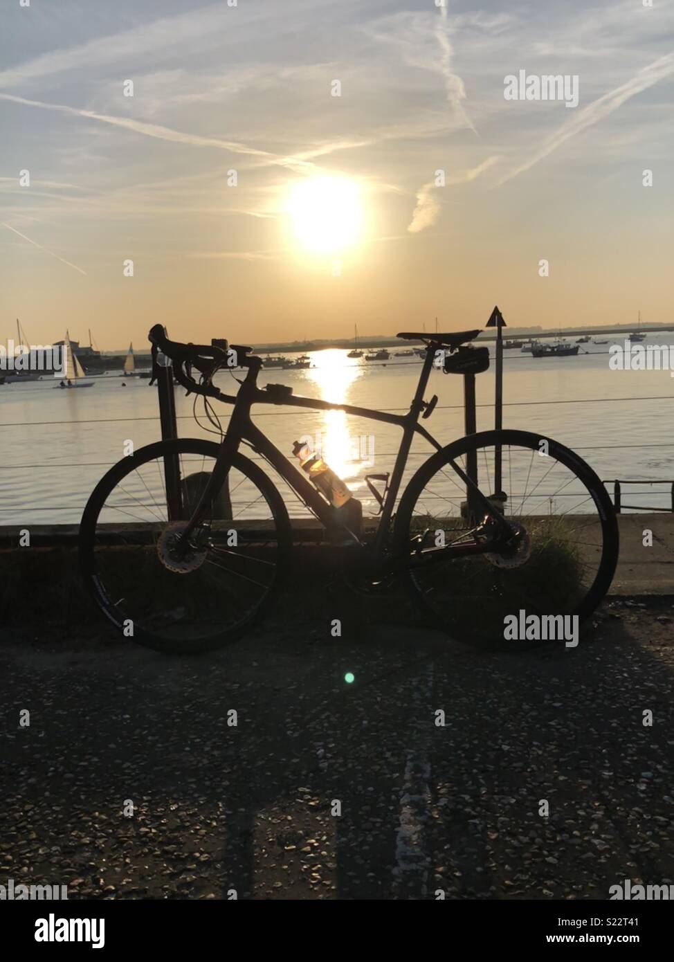 Sitting by bike sunset hi-res stock photography and images - Alamy