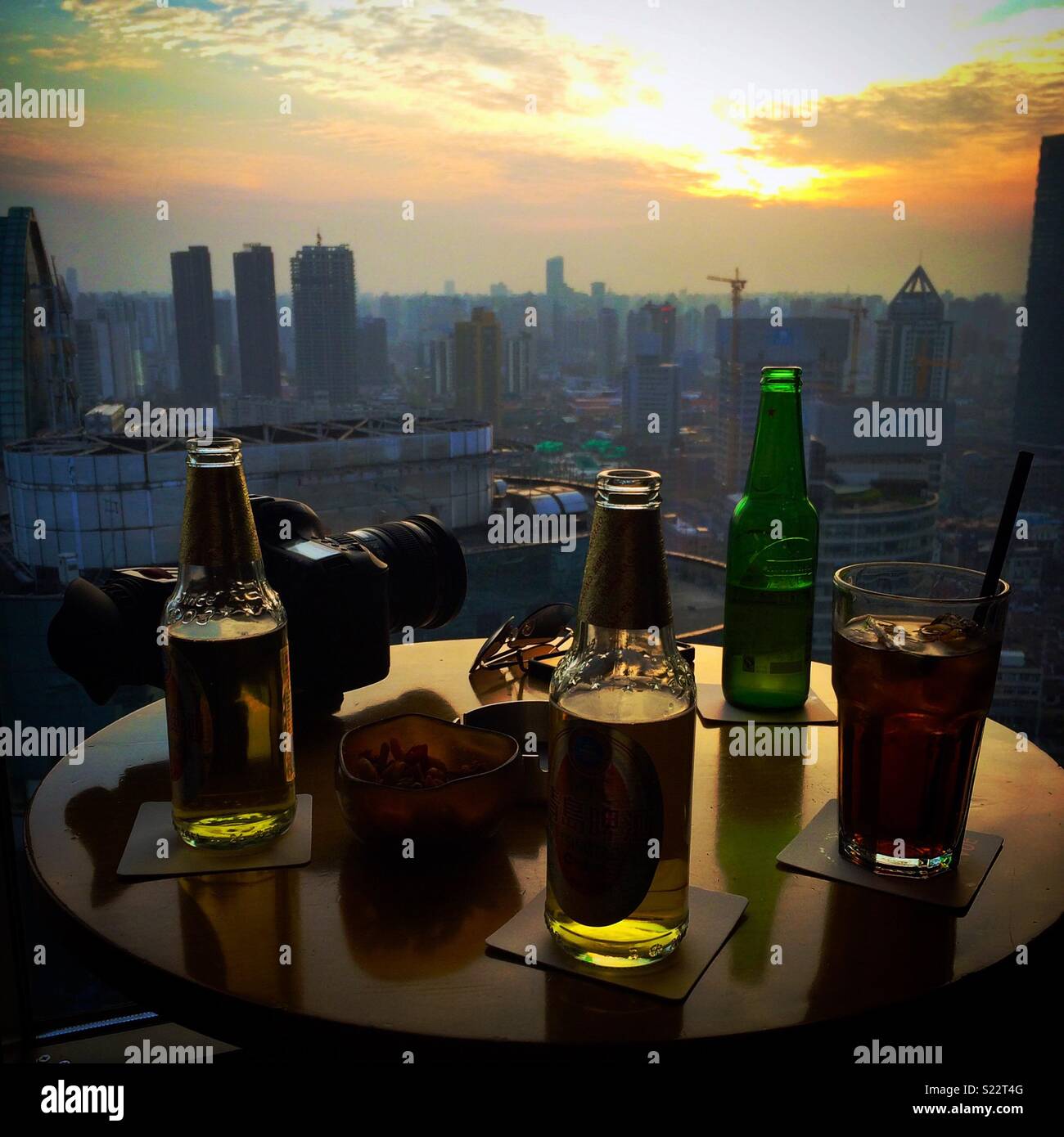 Rooftop drinks over Shanghai Stock Photo - Alamy