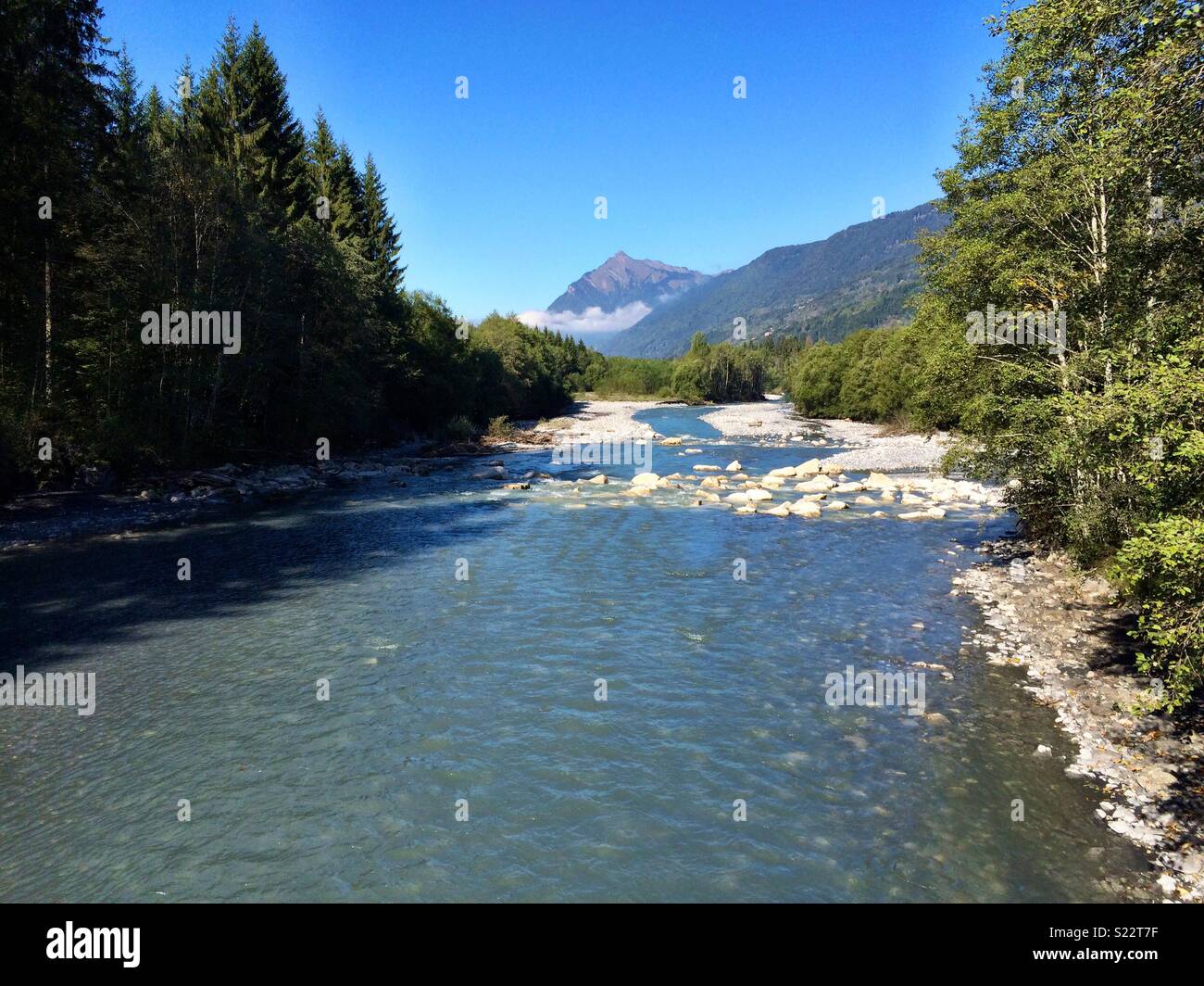 River running from mountain during summer in the French Alps Stock ...