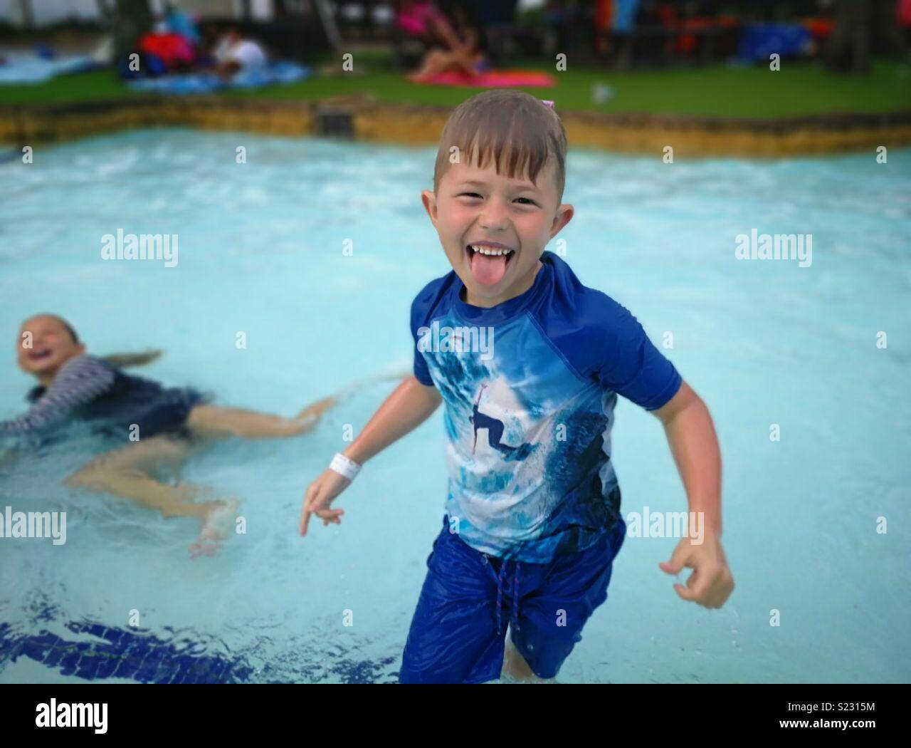 Running out of the pool Stock Photo - Alamy