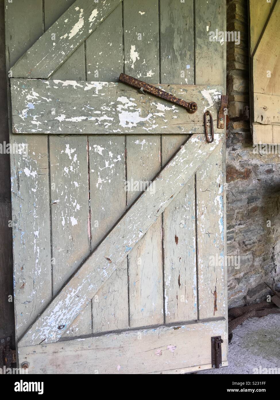 Shabby chippy paint door Stock Photo - Alamy