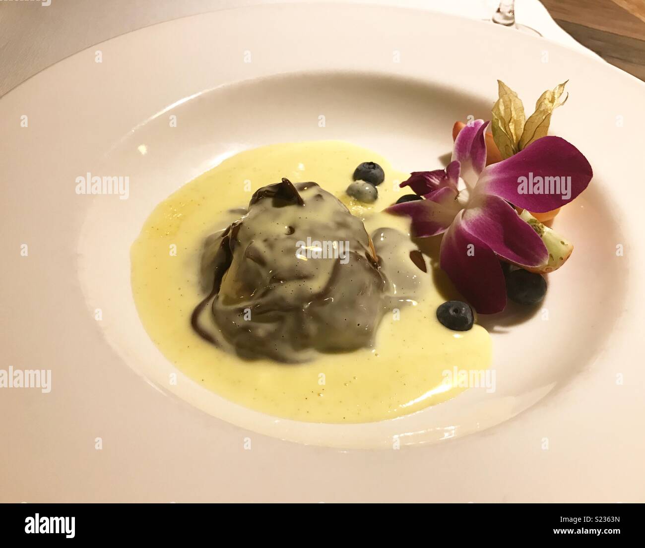 Melted chocolate dome Stock Photo - Alamy