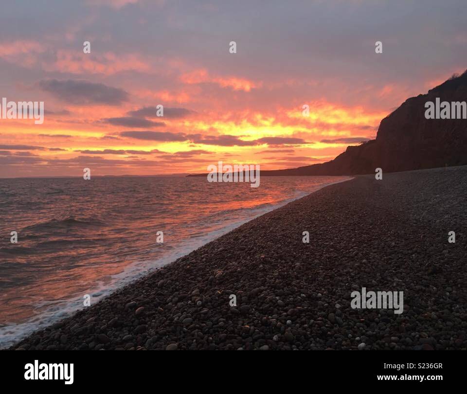 The Jurassic Coast golden sunset Stock Photo - Alamy