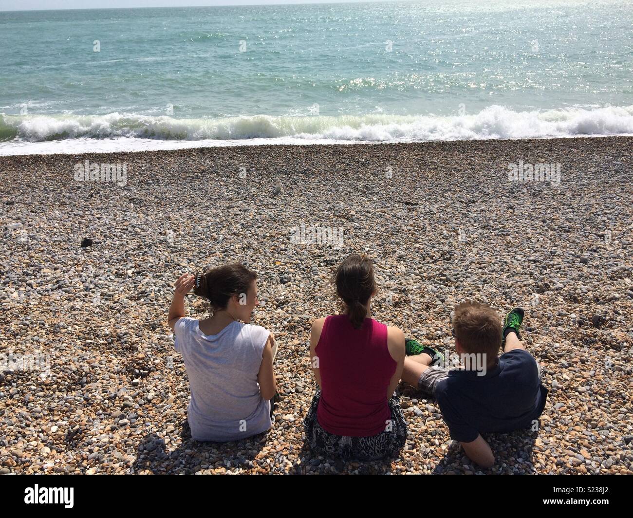 Friends on the beach hi-res stock photography and images - Alamy