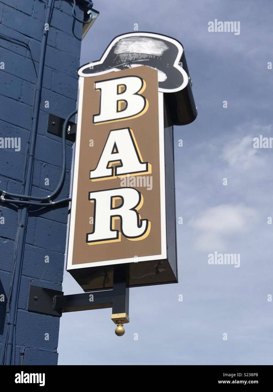 Bar sign on side of building Stock Photo - Alamy