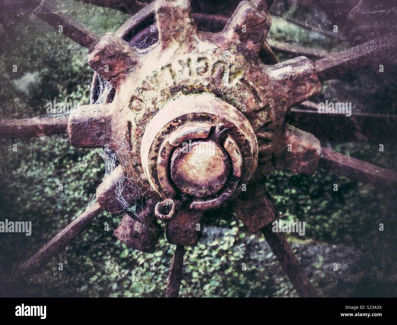 Middle section of an old rusty cart wheel Stock Photo - Alamy