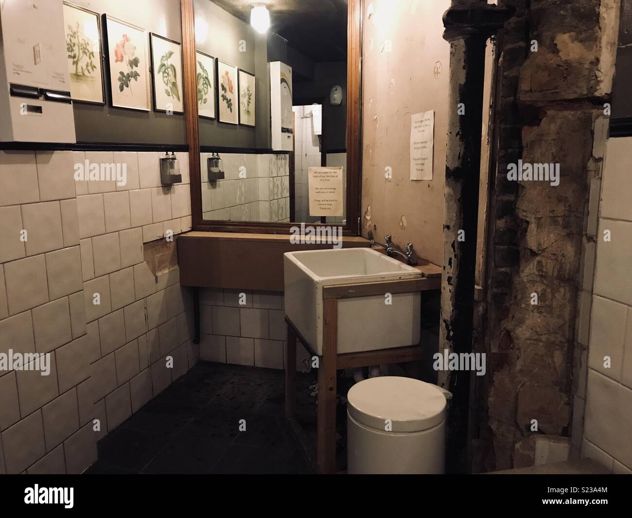 London pub bathroom Stock Photo - Alamy