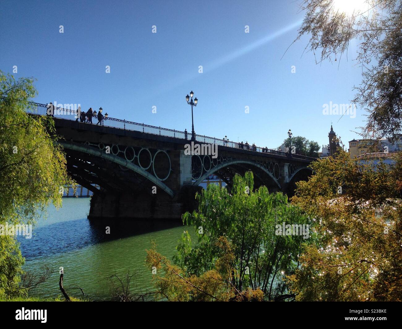 Isabel II Bridge and Guadalquivir River, Seville Stock Photo - Alamy
