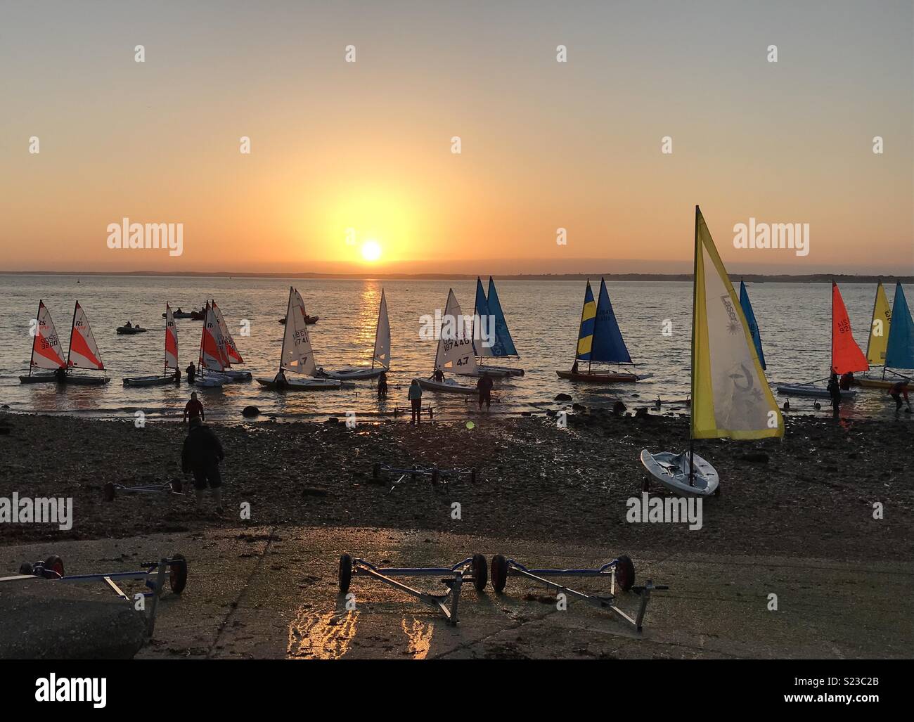 Colourful dinghy sails hi-res stock photography and images - Alamy