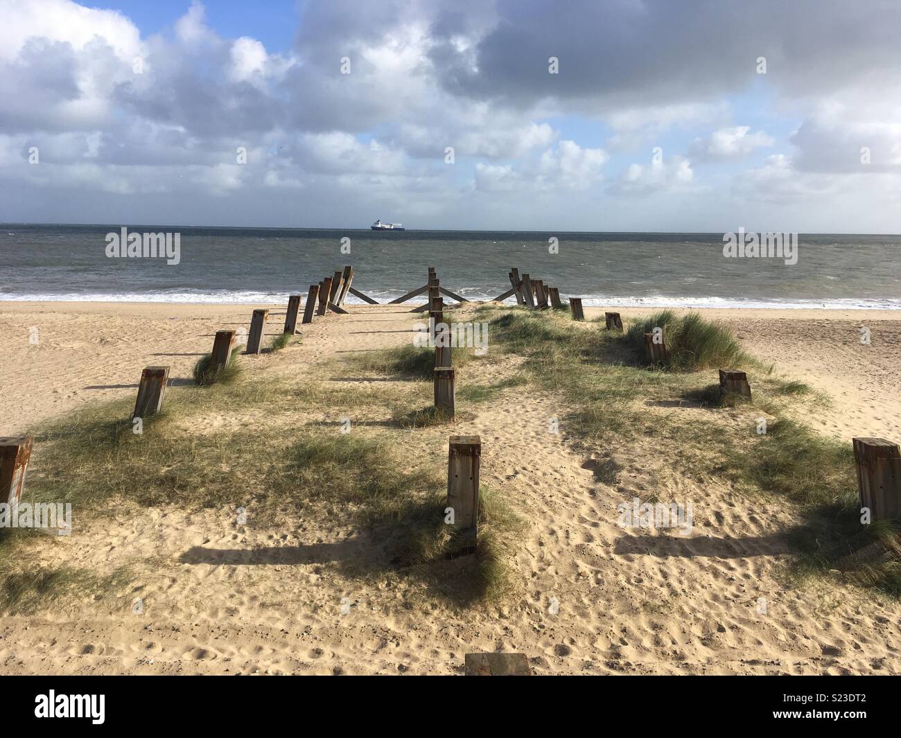 Colour photo of beach and pier legs at Great Yarmouth, Norfolk, England ...