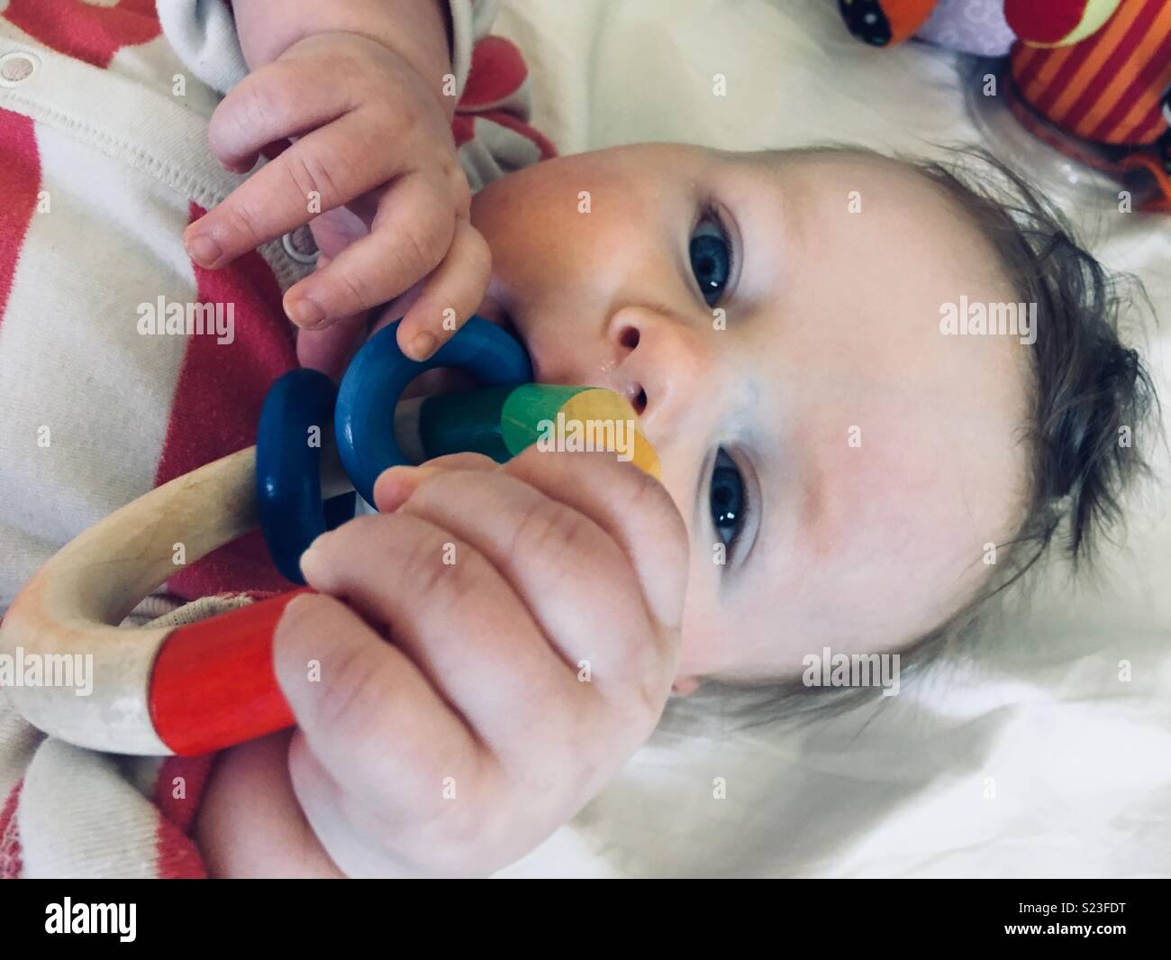 Baby smile toy hi-res stock photography and images - Alamy