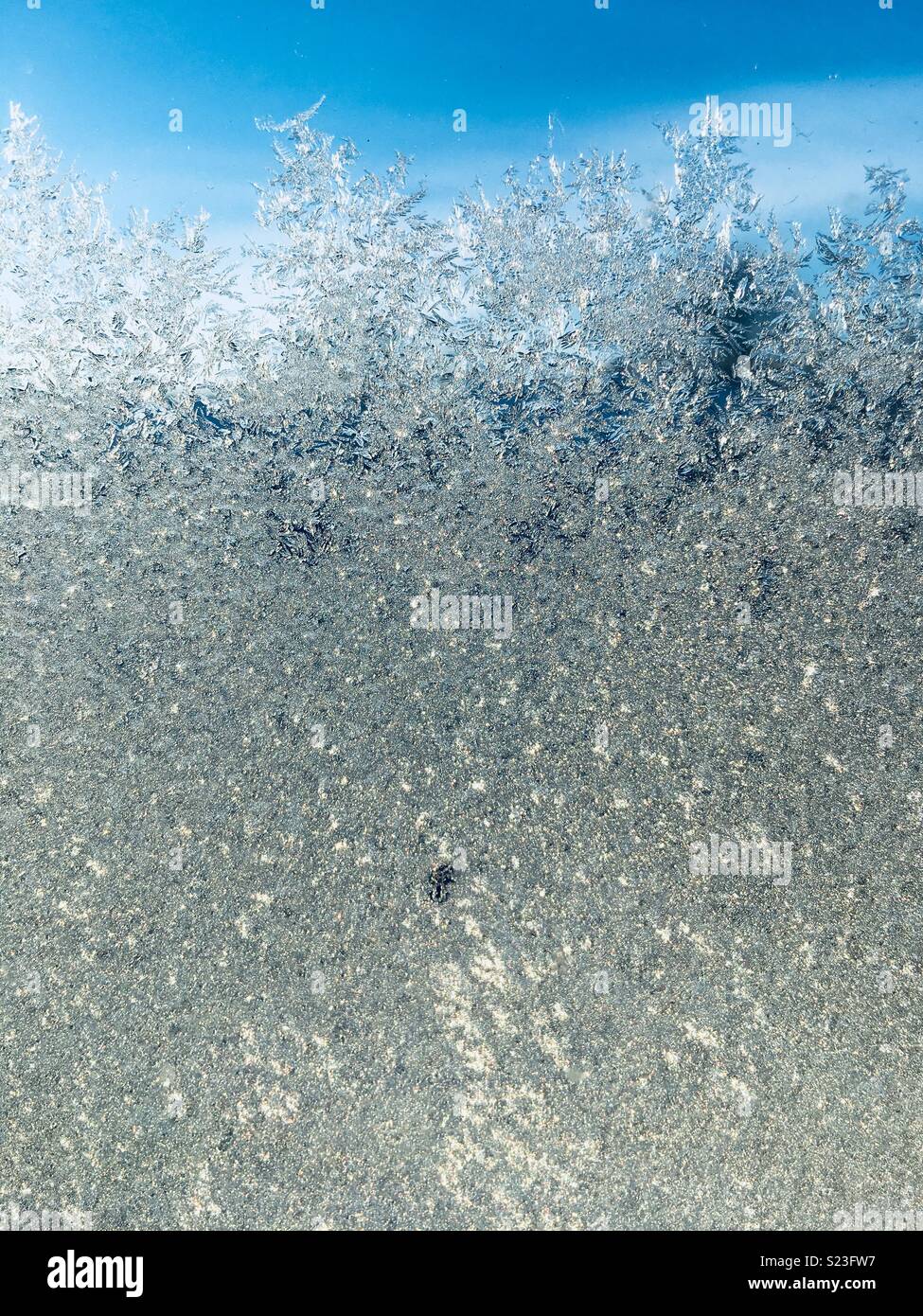 Ice on window Stock Photo - Alamy