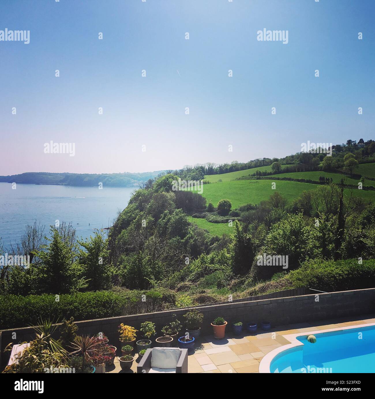 View out to sea from Maidencombe, Devon, with swimming pool in ...