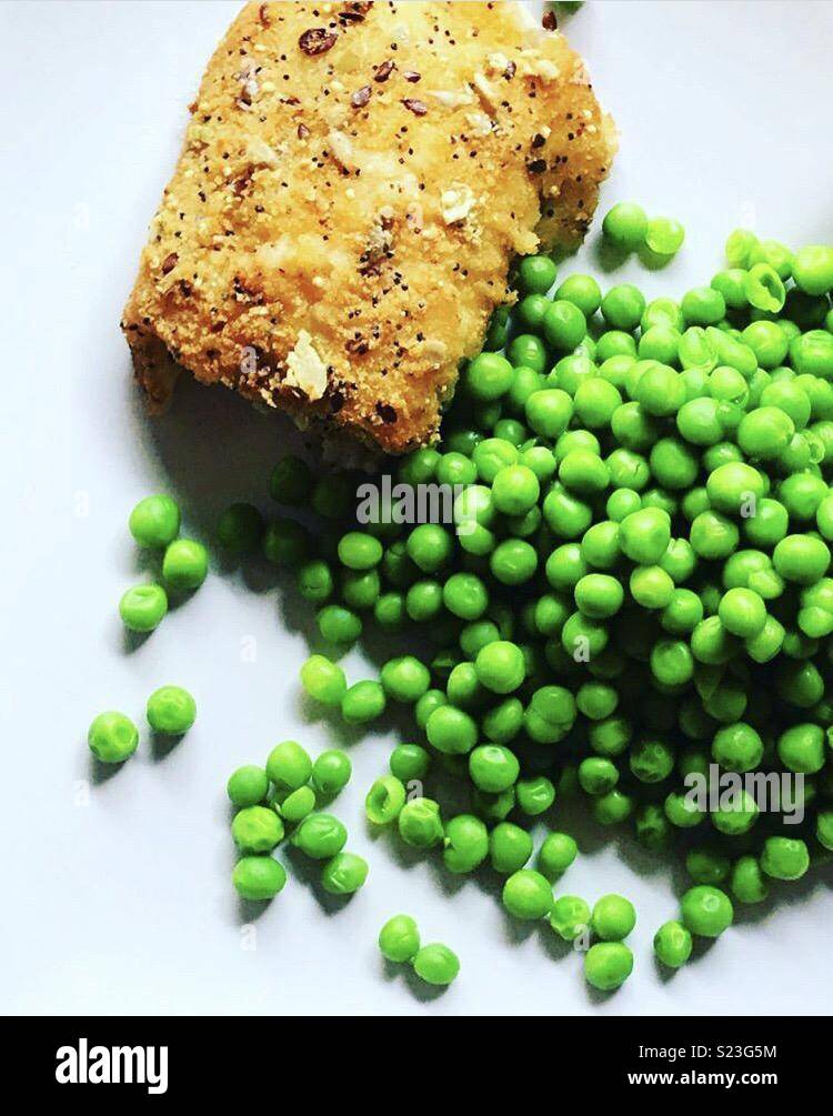Fish and peas Stock Photo - Alamy