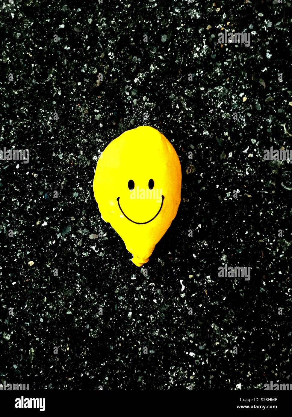 Happy face balloon deflated hi-res stock photography and images - Alamy