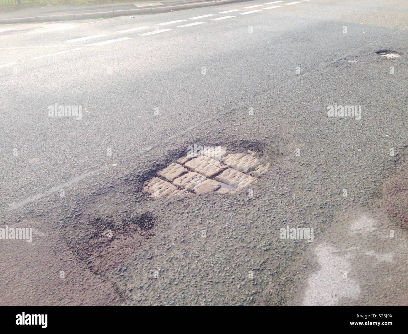 Old pothole hi-res stock photography and images - Alamy