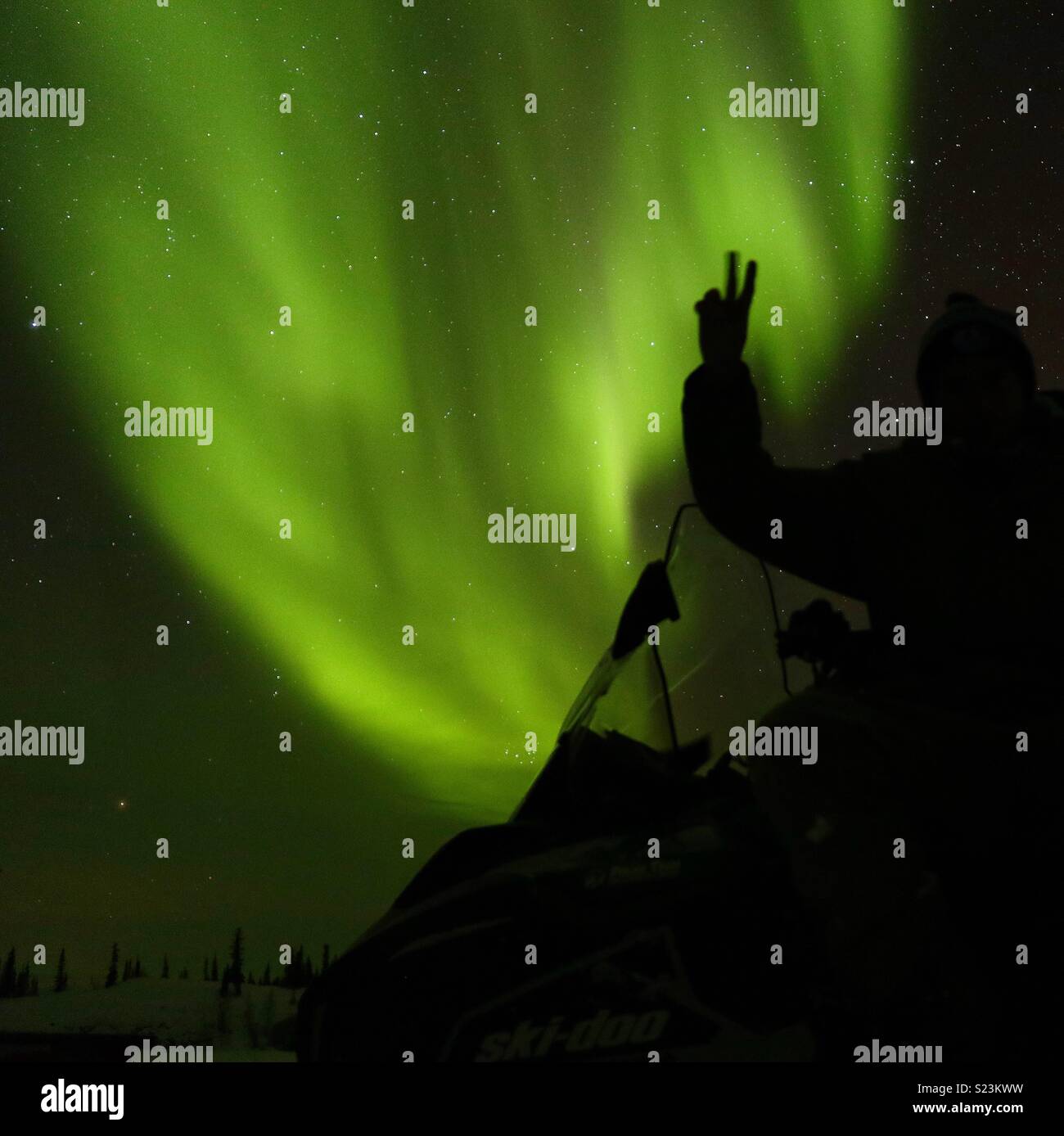 Snowmobile northern lights hi-res stock photography and images - Alamy