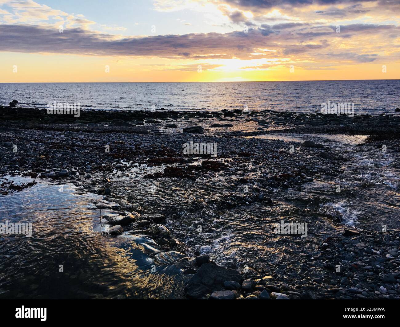 Sunset Isle of Man Stock Photo - Alamy
