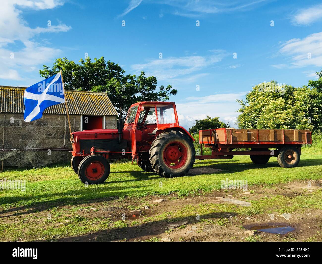 Tractor with flag hi-res stock photography and images - Alamy