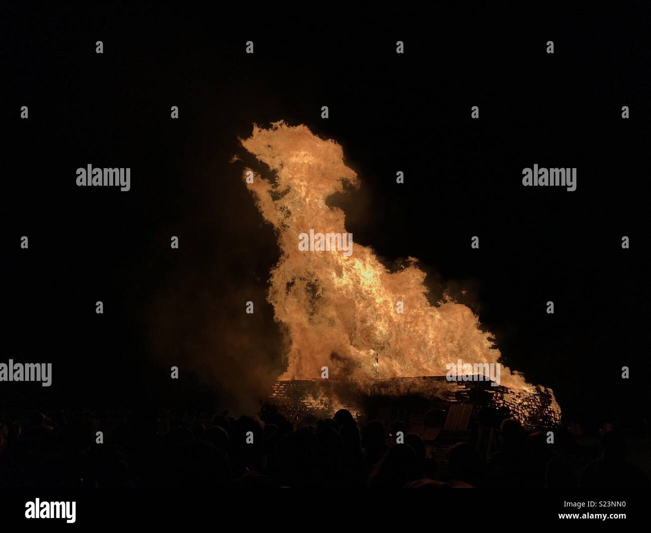 Bonfire with tall flames Stock Photo - Alamy