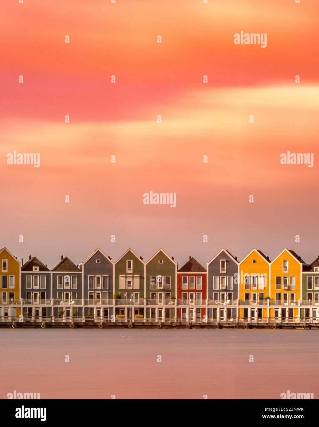 Red yellow orange houses hi-res stock photography and images - Alamy