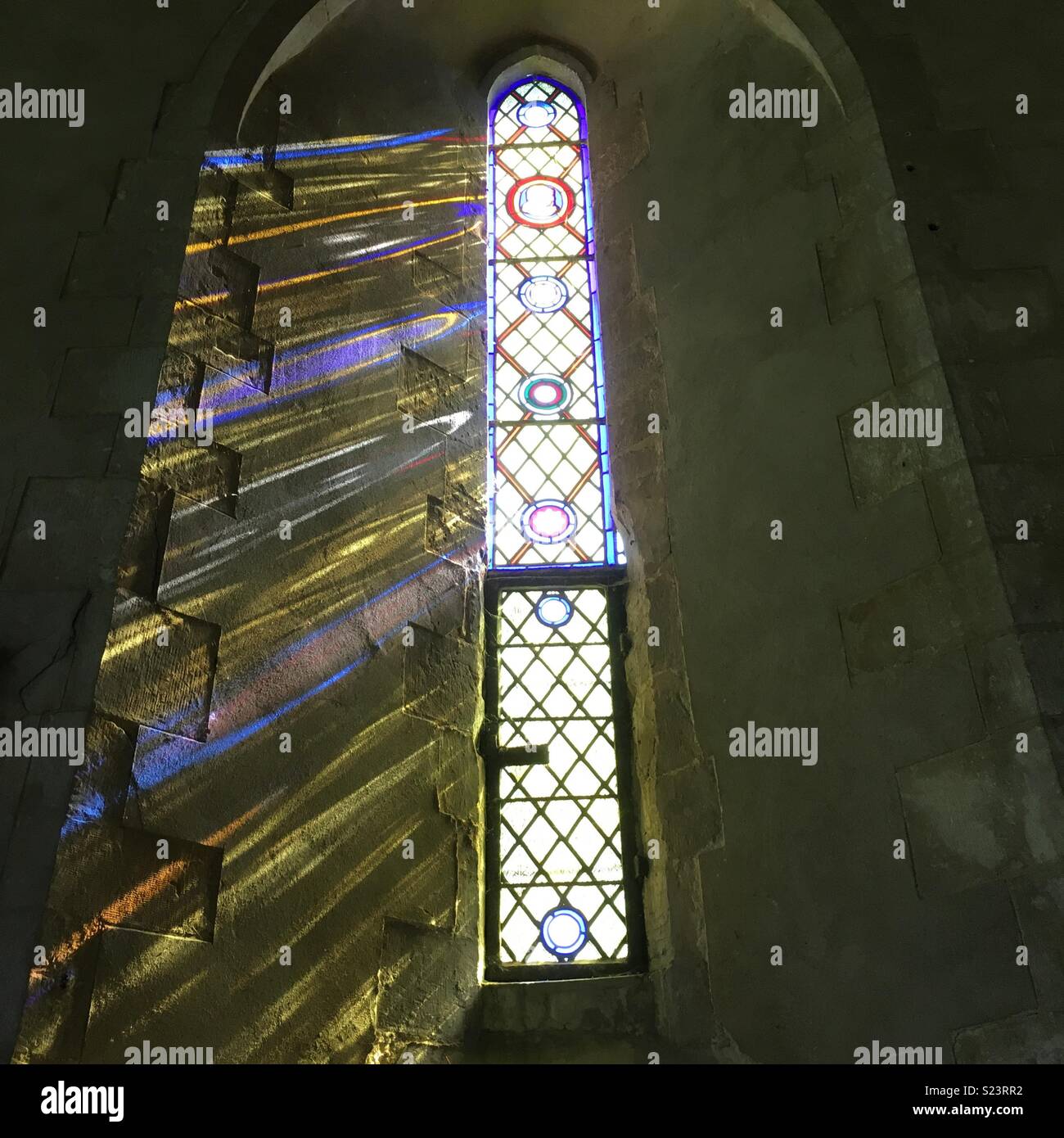 Sunlight through stained glass window hi-res stock photography and ...