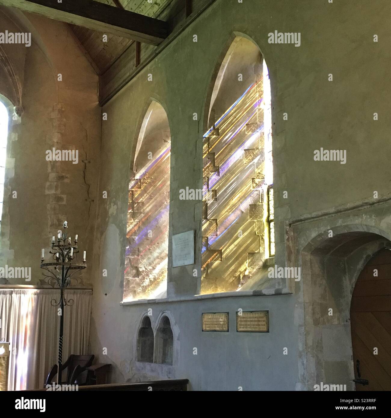 Sunshine through stained glass windows hi-res stock photography and ...