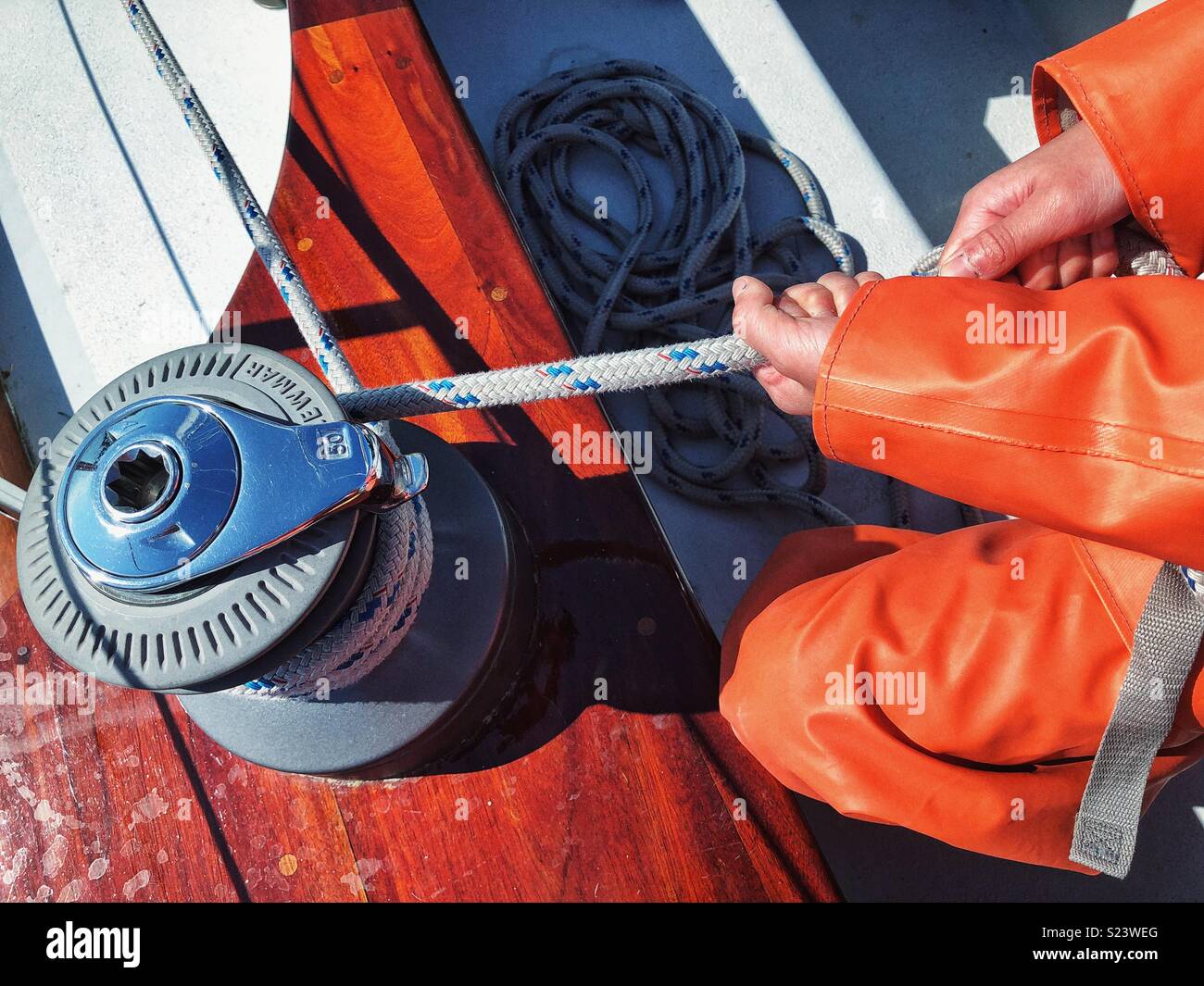 Holding the line on the wench Stock Photo - Alamy