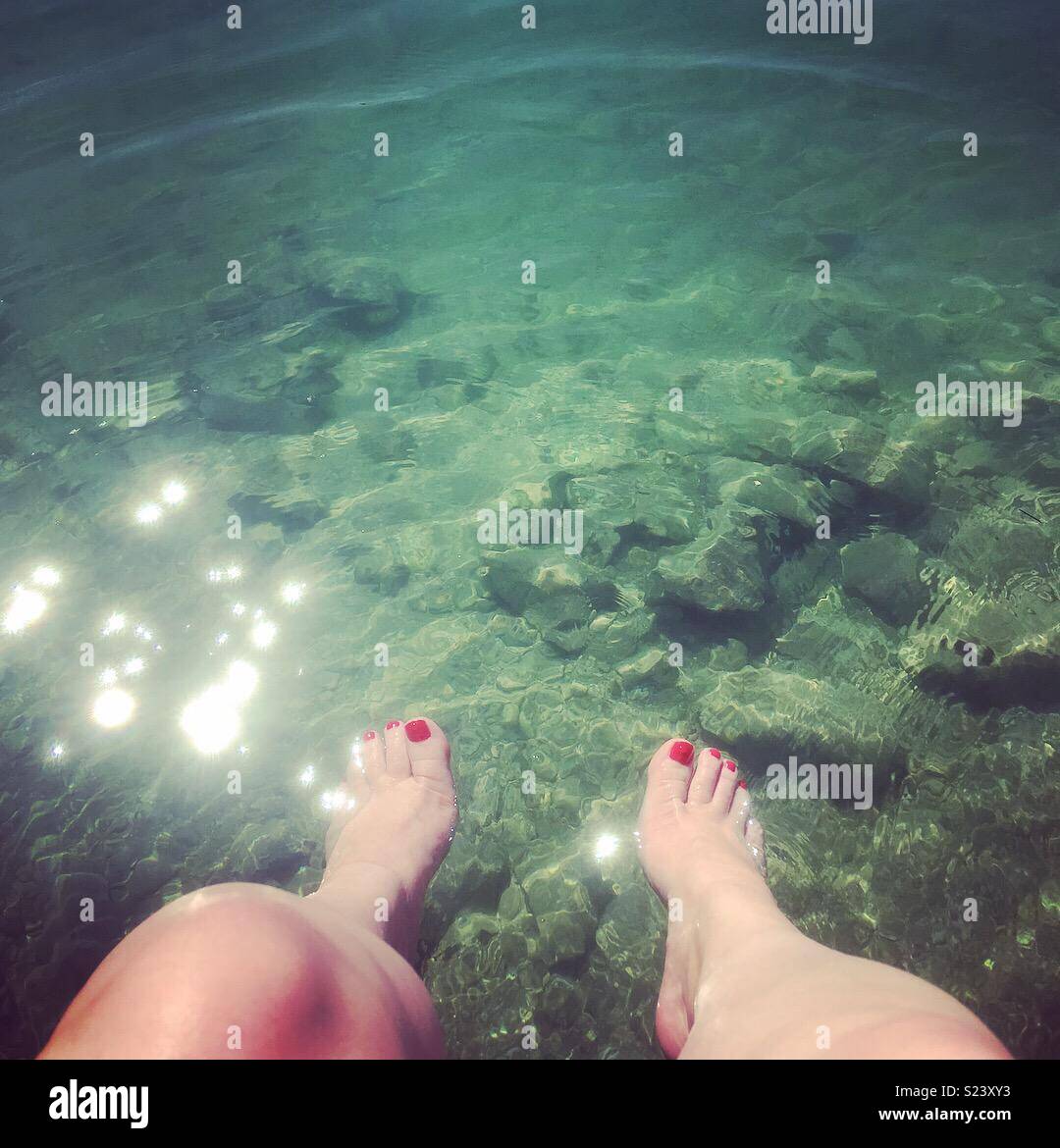 Dipping feet into water hi-res stock photography and images - Alamy