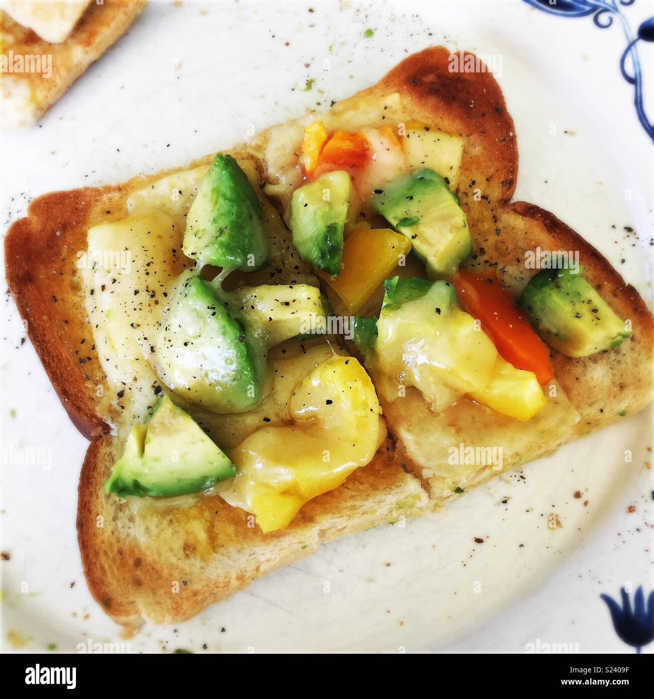 Cheese on toast grill cheese with vegetables on a plate Stock Photo - Alamy