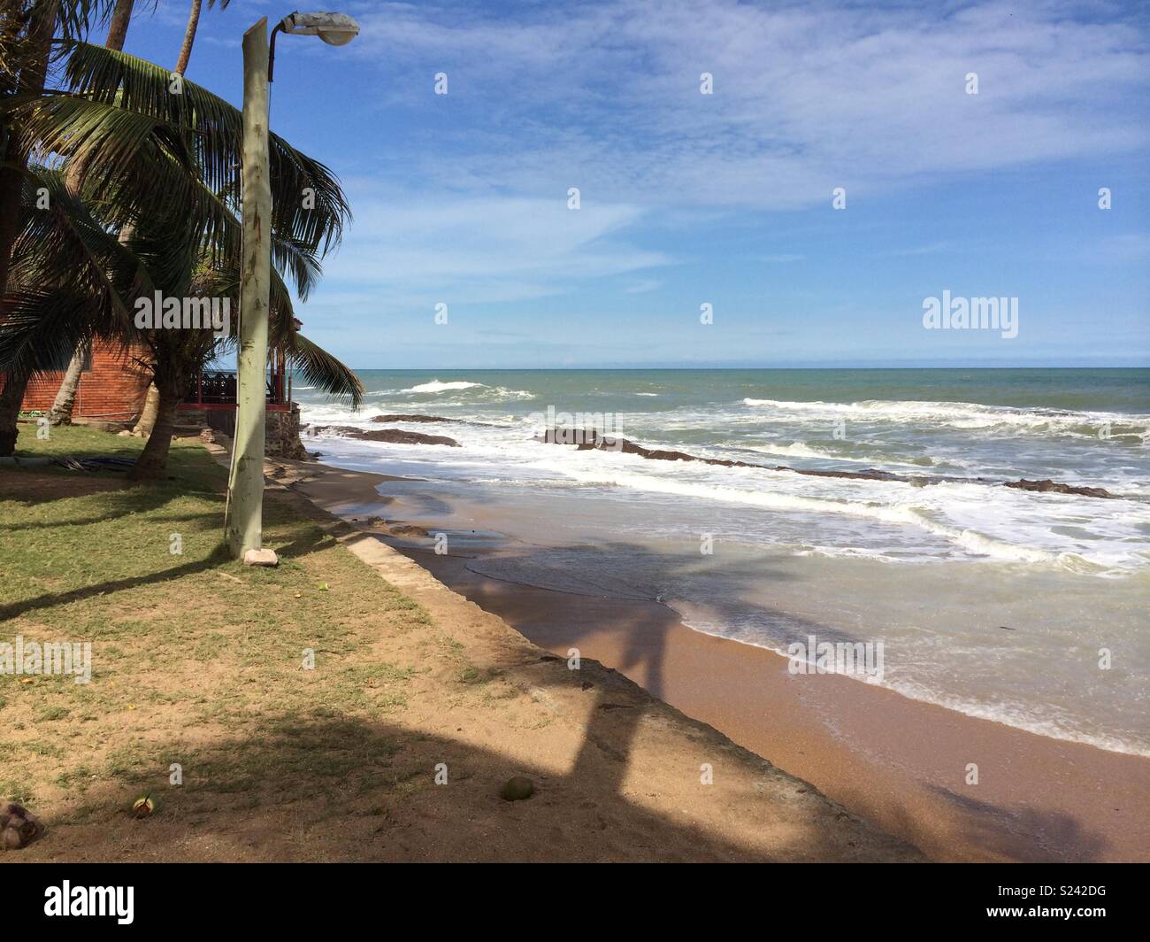 Atlantic Ocean seen from the Coconut Grove resort in Ghana Stock Photo ...