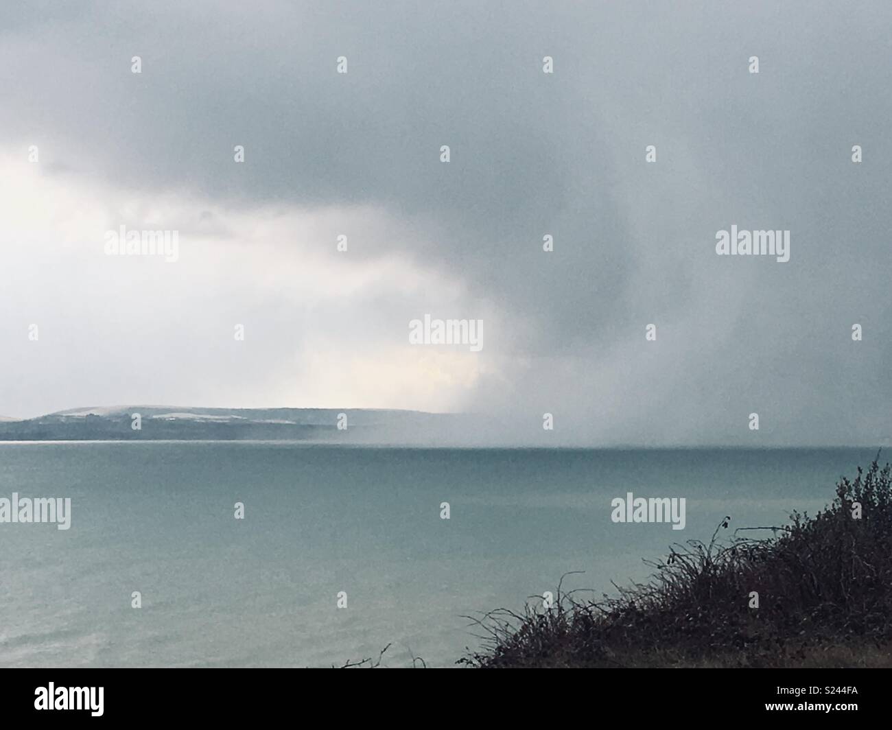 Snow fall over the sea Stock Photo - Alamy