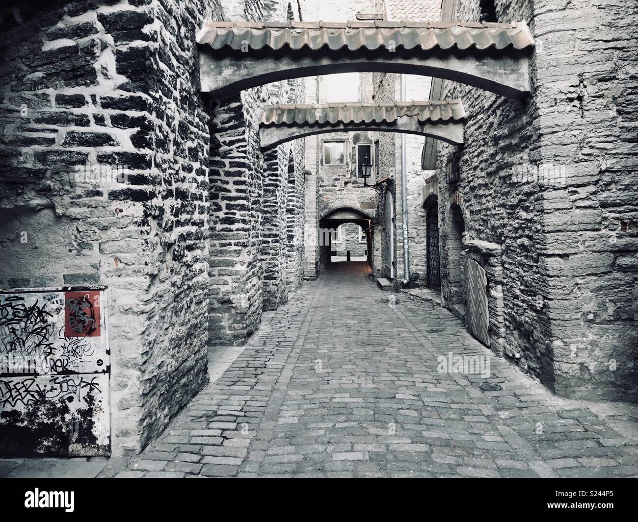 Tallinn estonia narrow city street smartphone stock photos and images ...