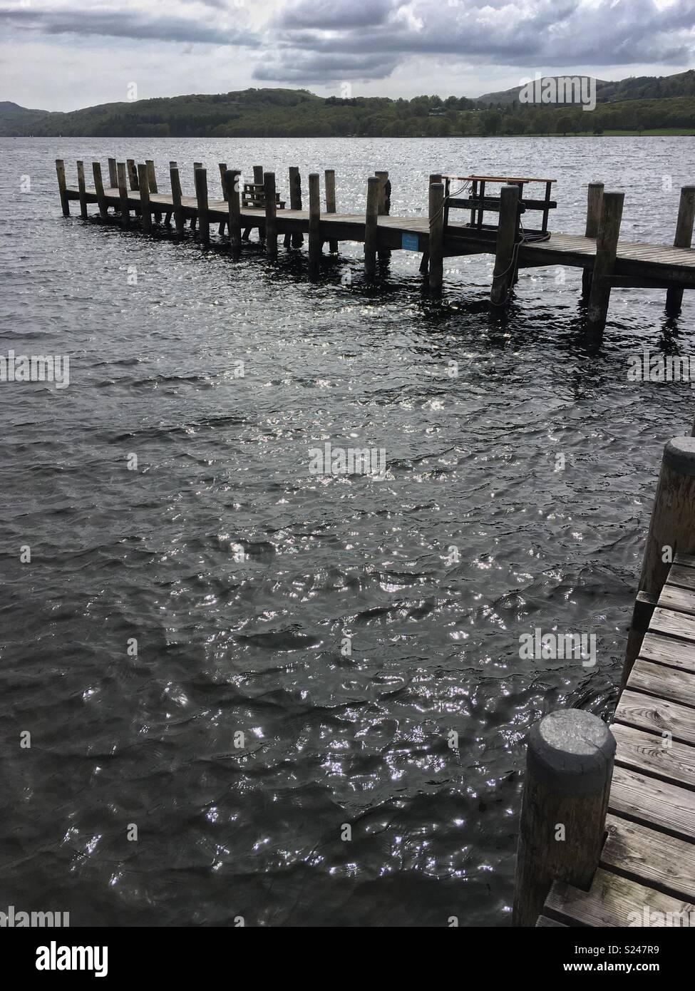 Wooden pier coniston Stock Photo - Alamy