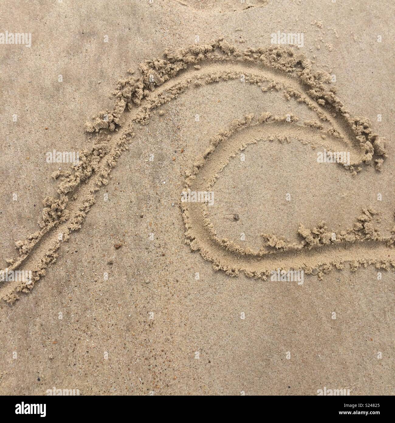 Beach sand hand drawn wave Stock Photo - Alamy