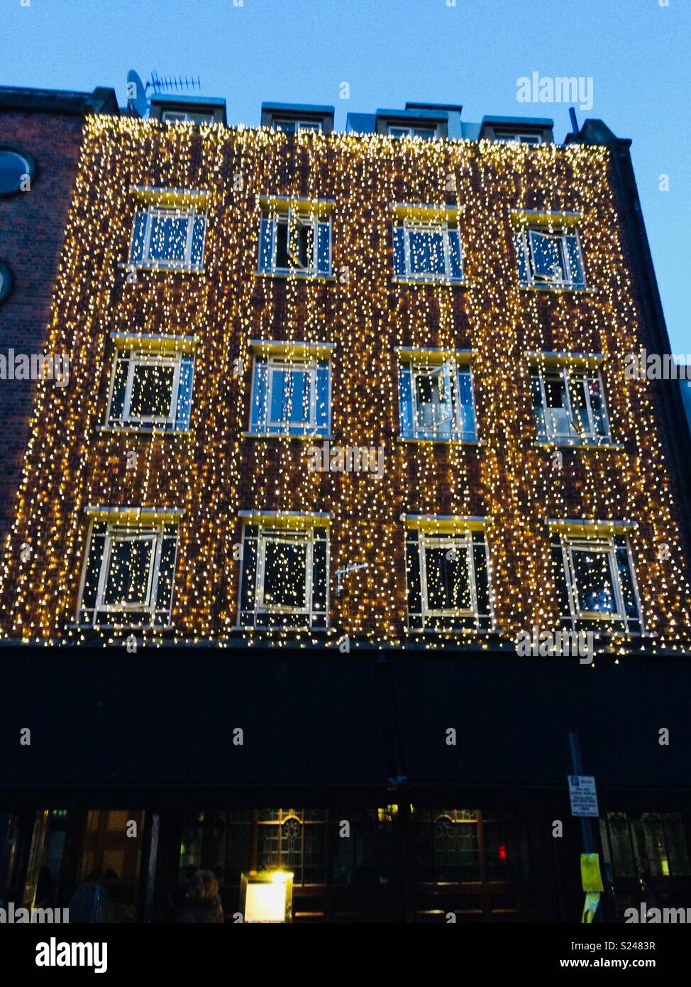 Lit up building in London Stock Photo - Alamy