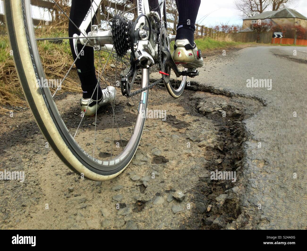 Pothole road cycling hi-res stock photography and images - Alamy