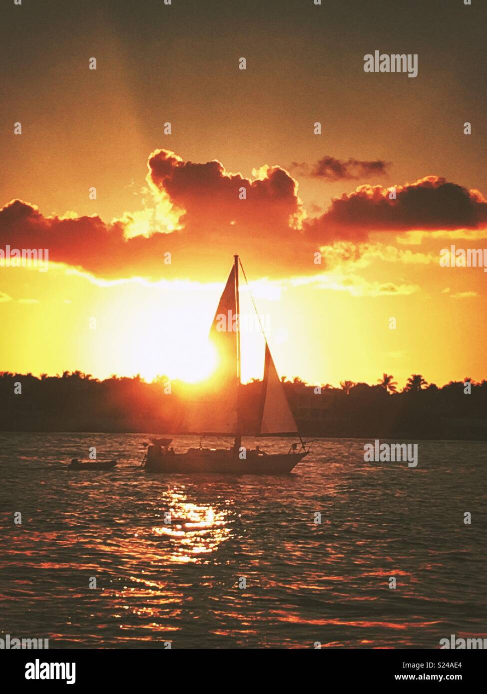 Sunset behind a boat in Key West, Florida Keys Stock Photo - Alamy