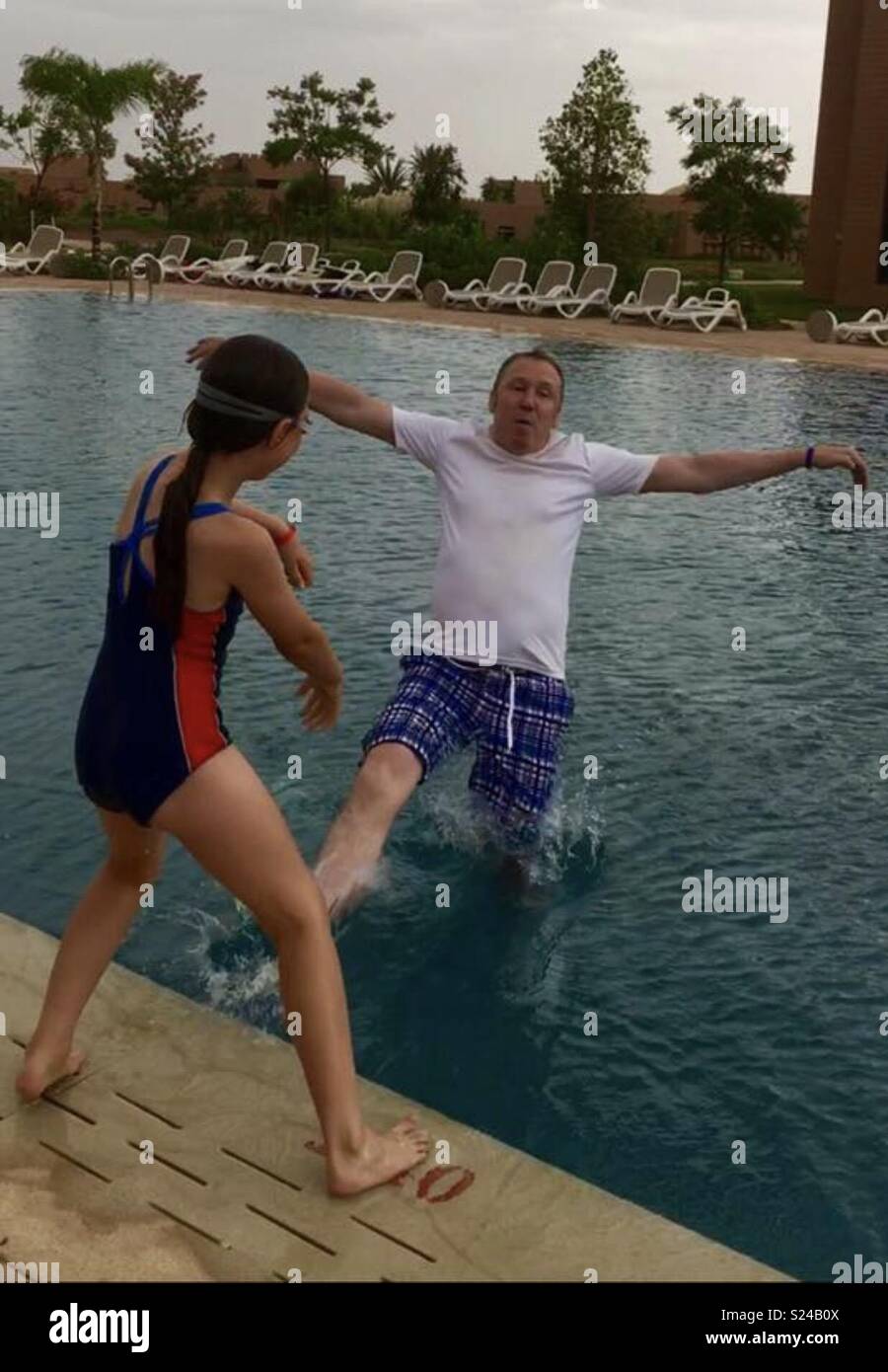 Water park swimming pool pushed in Stock Photo - Alamy