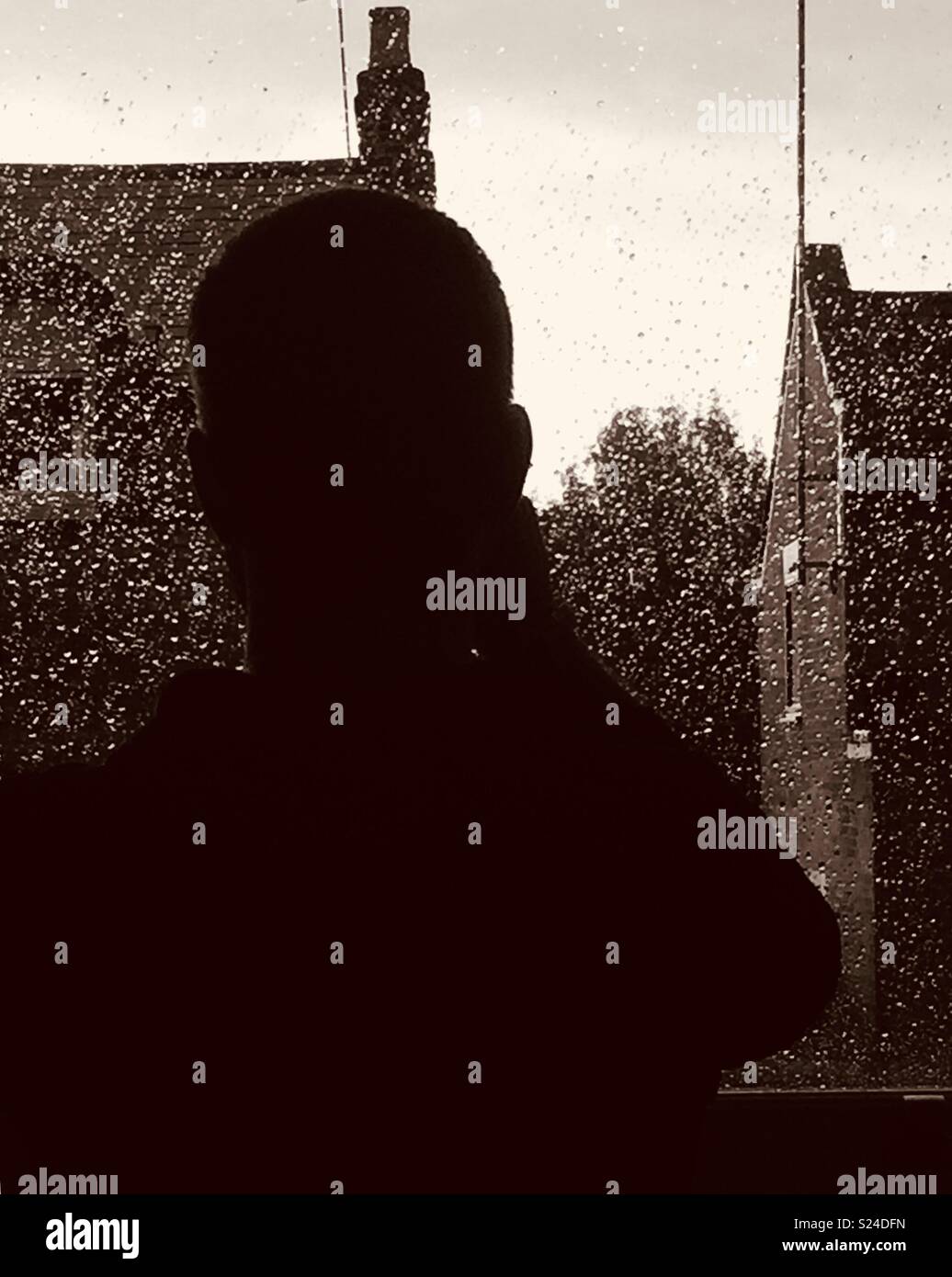 Man window silhouette rain hi-res stock photography and images - Alamy