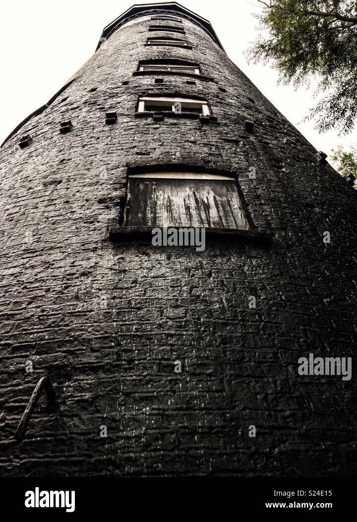 Old Black mill Stock Photo - Alamy