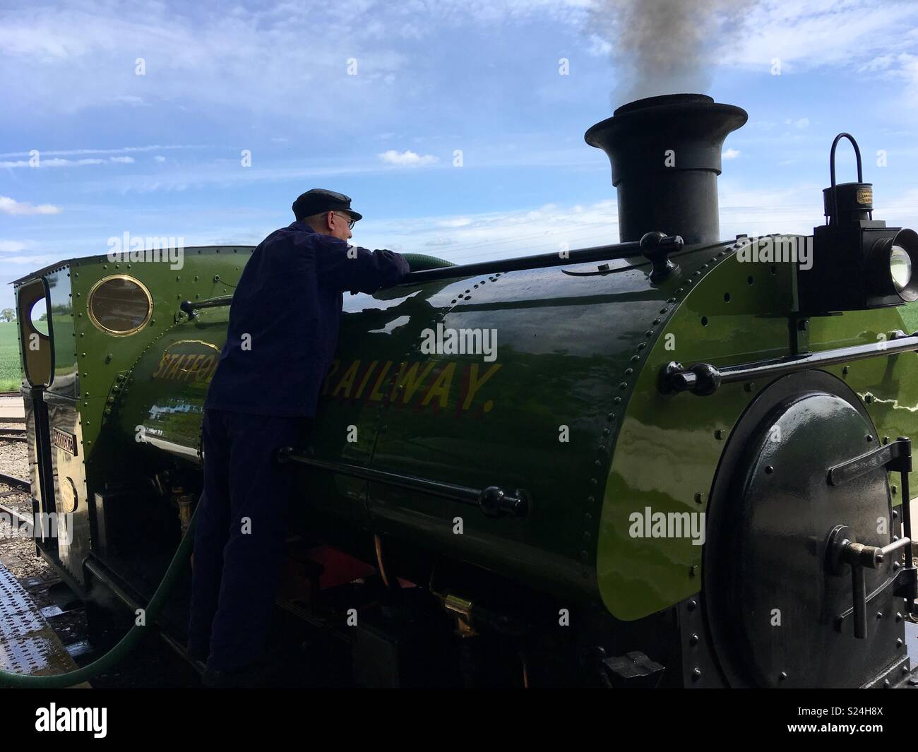 One man and his steam engine Stock Photo - Alamy