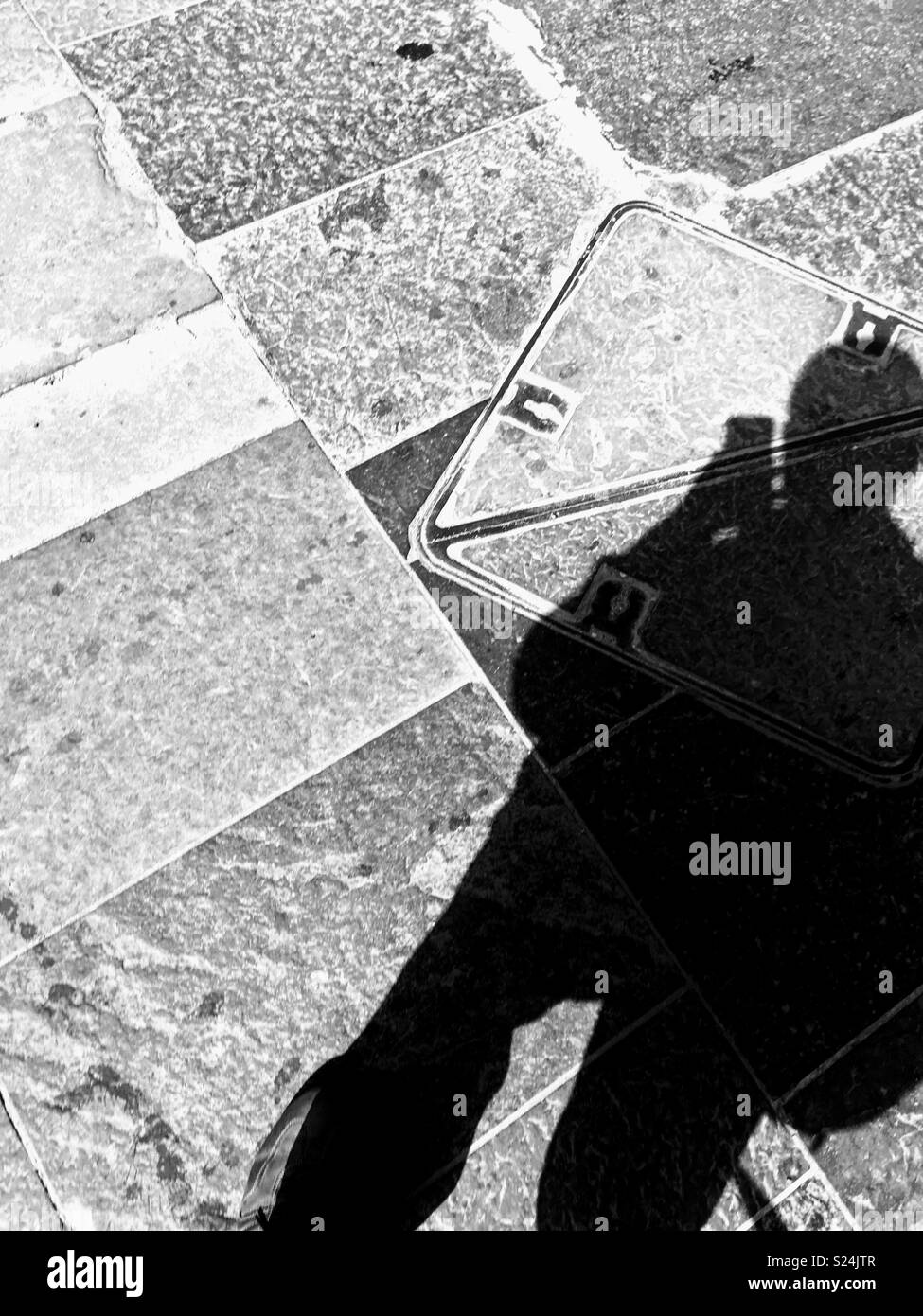 Human Shadow on the pavement Stock Photo - Alamy