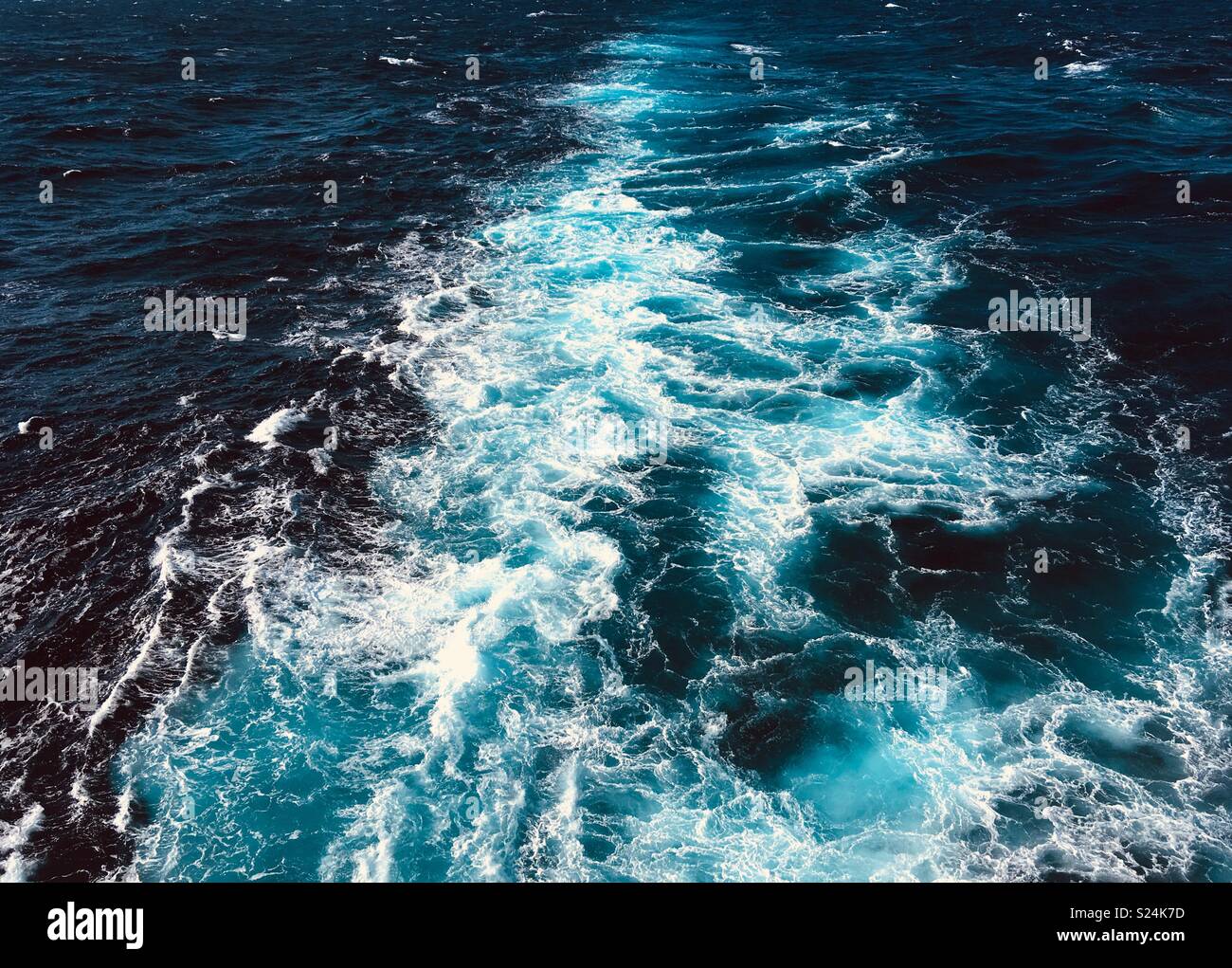 The wake of a cruise ship in the Atlantic Ocean Stock Photo - Alamy