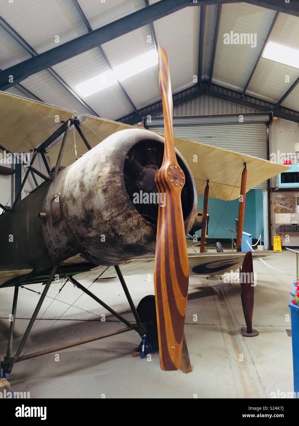 Old biplane in hangar Stock Photo - Alamy